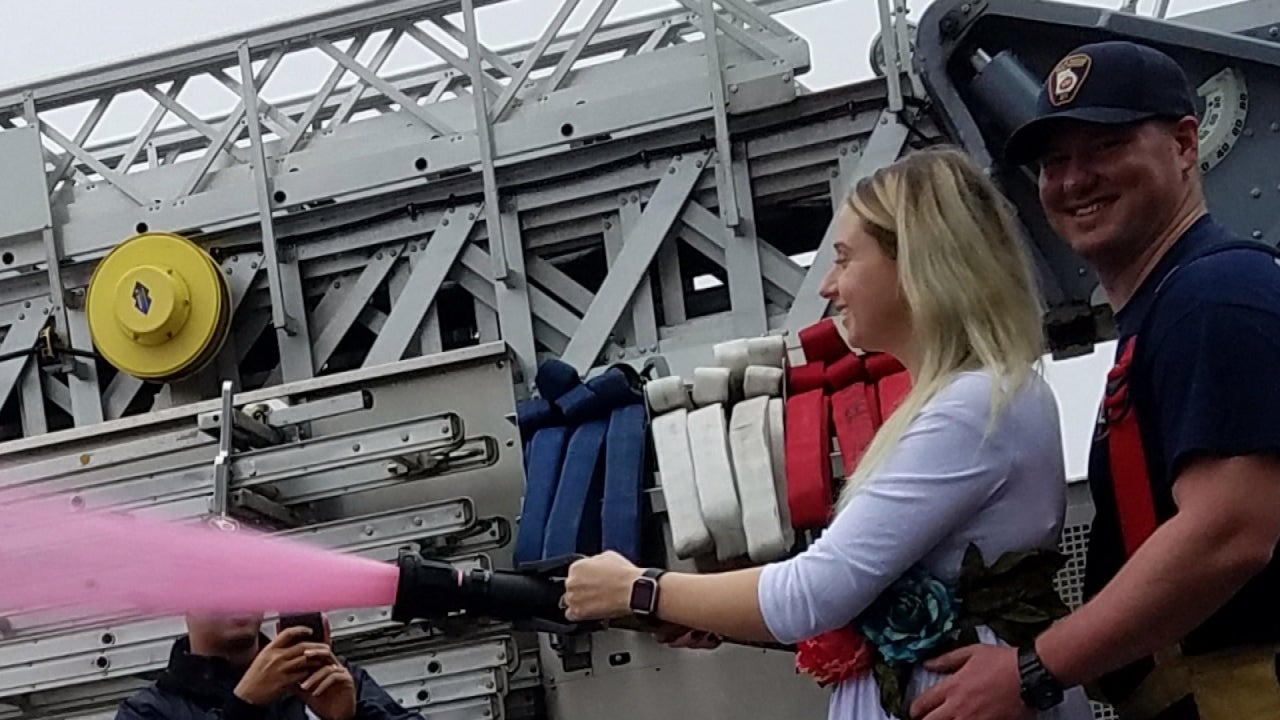 Firefighter and Wife Reveal Baby's Gender During Training Session ...