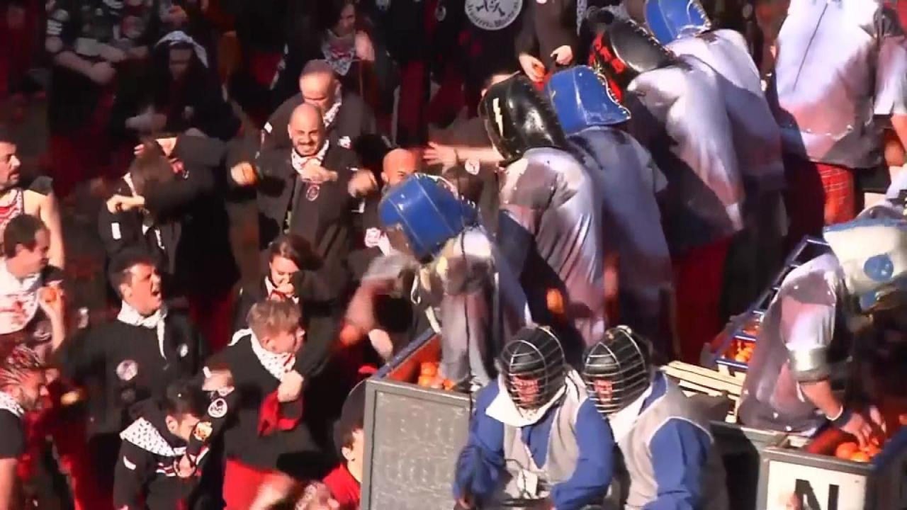 Food Fight! Townspeople Throw Citrus at Each Other for Battle of ...