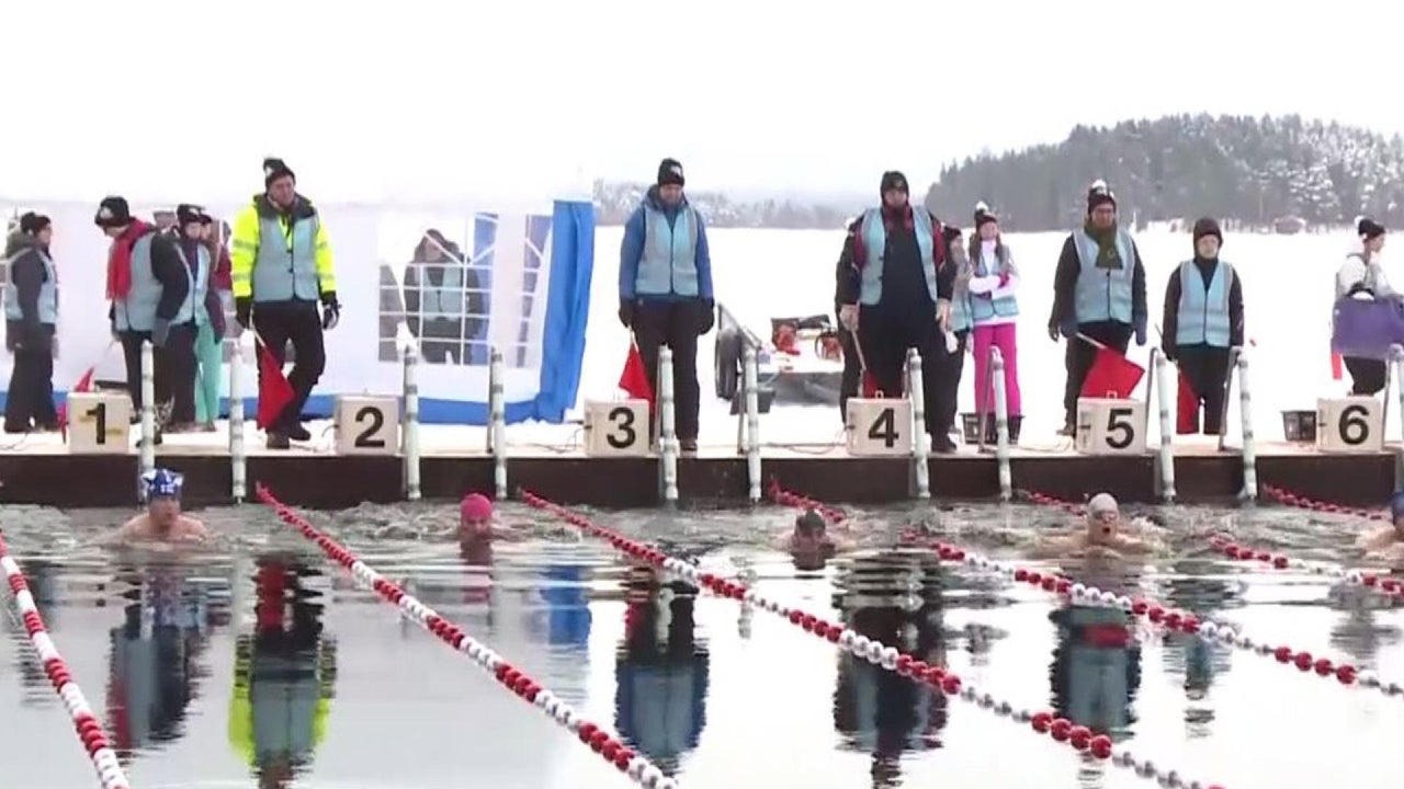 These Swimmers Love Bone-Chilling Arctic Temperatures | Inside Edition